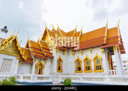 Golden pagoda of marble busshist temple sightseeing in Bangkok city ...