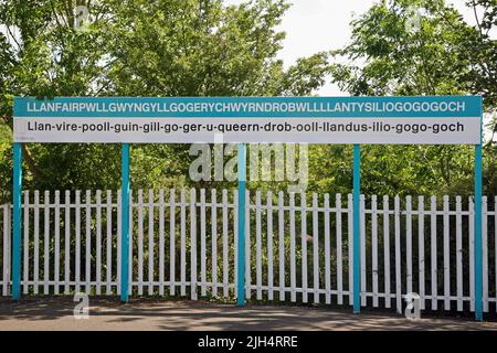 The station platform sign of the longest place name in the world which ...