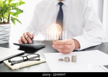 Concept of energy efficiency with lightbulb Stock Photo - Alamy