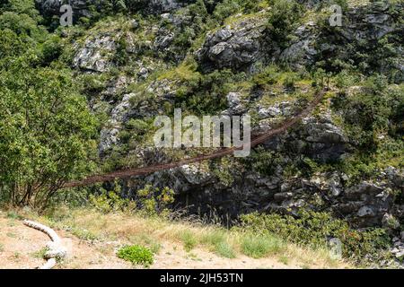 Sights of Montenegro. Landmark Old rusty bridge. Attraction Long ...