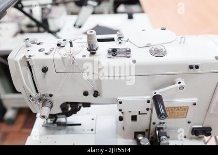 Industrial coverstitch sewing machine close up. Selective focus Stock ...