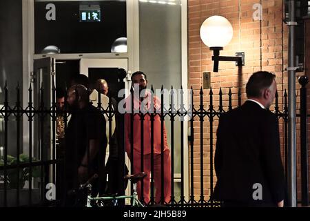 *CAPTION CORRECTION* Artist Drake leaves Grand Hotel through a back ...