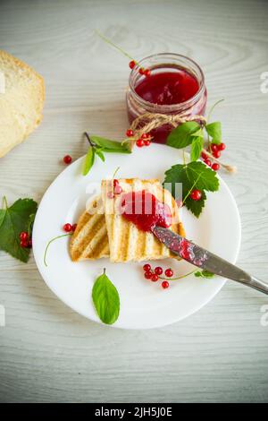 sweet croutons on a plate, on a wooden background, traditional Russian ...