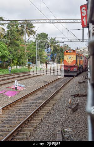 A train is coming to station in India Stock Photo - Alamy