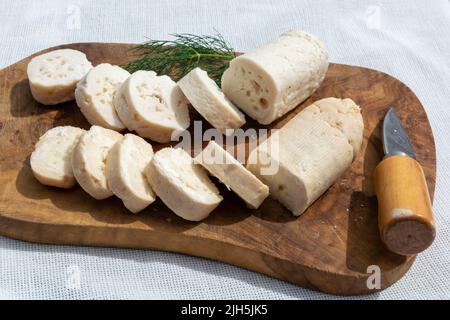 Artisan homemade organic white hard goat cheese from small goat farm in ...