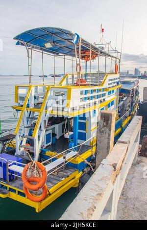 an excursion or event boat for diving tours at a pier in Thailand ...