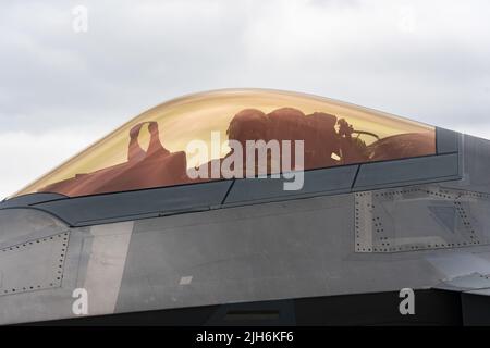 U.S. Air Force Col. Travolis A. Simmons, center, passes the 3rd Wing ...