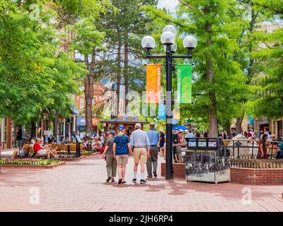 Colorado, JUL 2 2022 - Daytime view of some stores in Pearl Street Mall ...