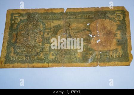 Old Five Rupee notes combined on the table, India money on the rotating ...
