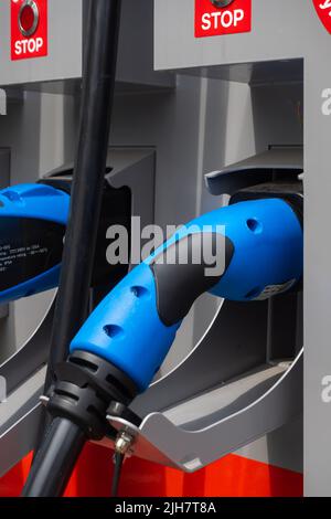 Fast charging plugs at public electric car charging stations ...