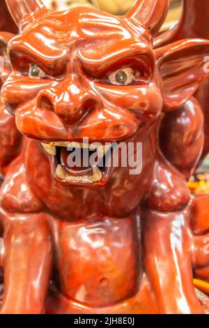 The famous Little Red Devil statue located in Stonegate, York Stock ...