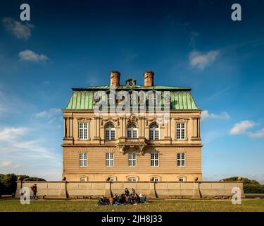A beautiful view of Hermitage Palace at dyrehaven deer park in Denmark ...