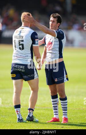 Stefan Ratchford #1 consoles Joe Bullock #15 of Warrington Wolves after ...