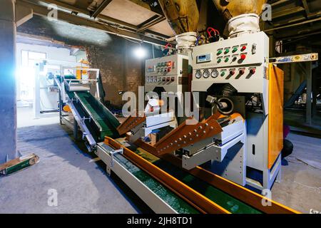 Cement packaging, bagging and stacking machine Stock Photo - Alamy