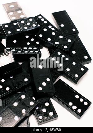 Pile of classic domino tiles on white background Stock Photo - Alamy