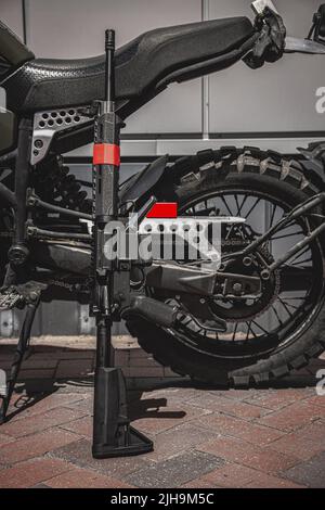 Automatic carabiner on a motorcycle. Weapons for police, special forces ...