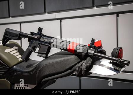 Automatic carabiner on a motorcycle. Weapons for police, special forces ...