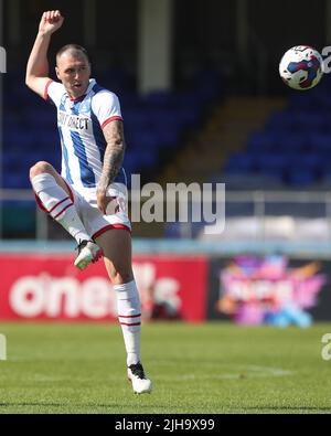 Callum Cooke of Hartlepool United in action with Borehamwood's Kabongo ...