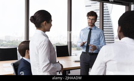 employees are discussing work issues Stock Photo - Alamy