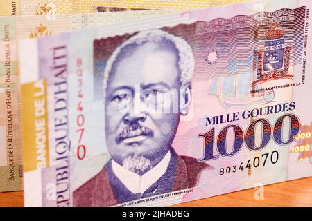Haitian money - gourde a business background Stock Photo - Alamy