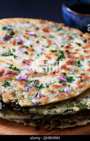 Homemade appetizing scallion pancakes served with soy sauce Stock Photo ...