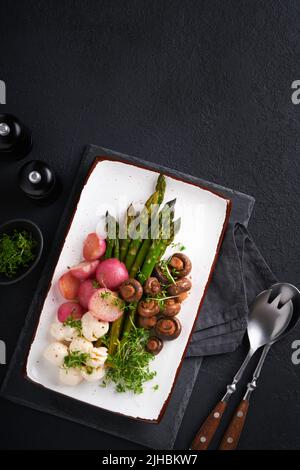 Asparagus, mushrooms, mozzarella cheese, grilled radish and cress salad ...