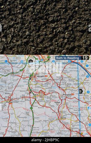 Open Road Atlas Book Placed On A Road Stock Photo - Alamy