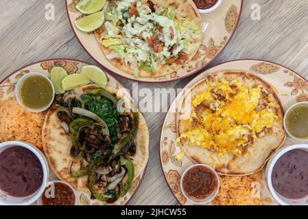 Thick homemade tortillas holds a variety of choices for a Latino food ...