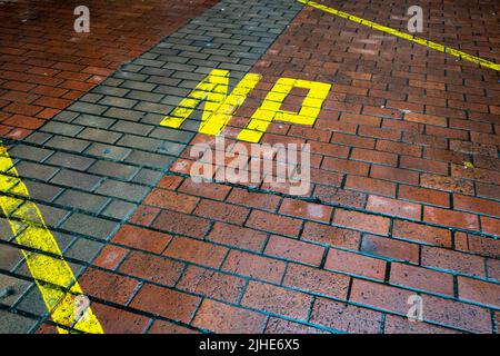 No parking signs on brick paving, Wellington, North Island, New Zealand ...