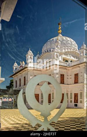 22 Dec 2010 Khanda (Sikh symbol) Shot thru Glass Panel Gurudwara Nanak ...
