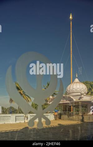 22 Dec 2010 Khanda (Sikh symbol) Shot thru Glass Panel Gurudwara Nanak ...
