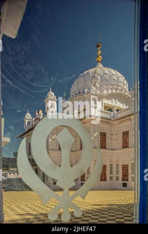 22 Dec 2010 Khanda (Sikh symbol) Shot thru Glass Panel Gurudwara Nanak ...