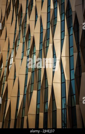 City residential building with crystalline style cladding. Abstract ...