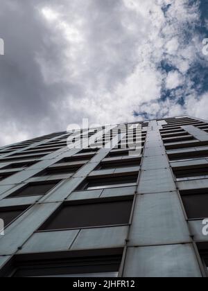 Tall apartment building. Fragment of a residential building ...