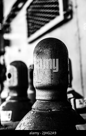 Compressed gas cylinders being stored vertically secured by a metal ...