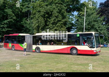 An articulated bus, known as a bendy bus, England, UK Stock Photo - Alamy