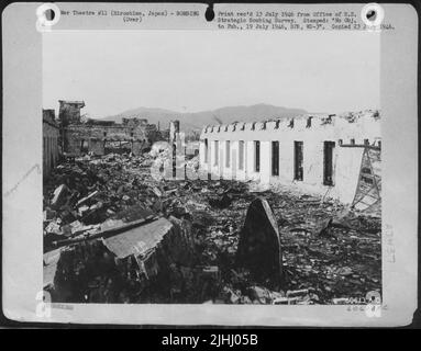 The blast effect of the atomic bomb at Hiroshima in August 1945 shows a ...
