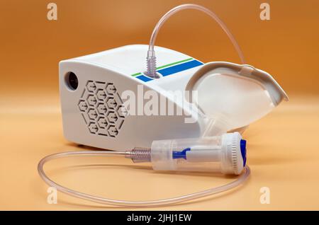 Medical Nebulizer isolated on orange background. Nebulizer treatment ...