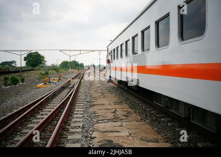 Railway station with wagon passanger train in java Indonesia Stock ...