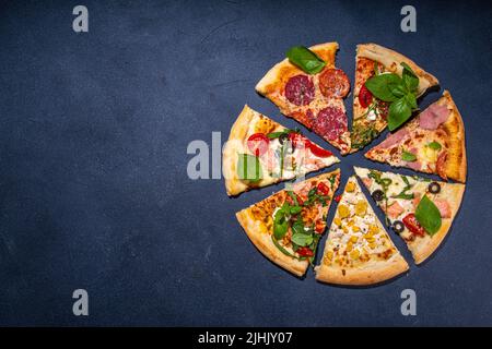 Various taste type pizza pieces with different traditional filling ...