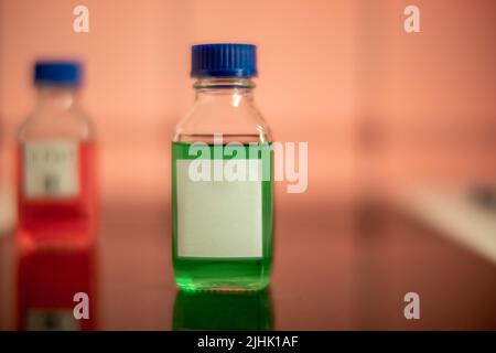 chemical bottle with blank sticker in chemistry lab Stock Photo - Alamy