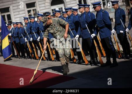 Bosnian Solider broom a red capter during a final preparation for two ...