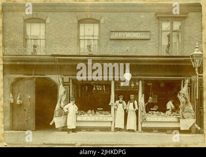 trade, shops, butcher's shop, young girl buying in butcher's shop ...