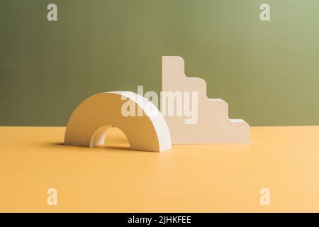 Set of gypsum and clay geometrical shapes on double pastel background ...