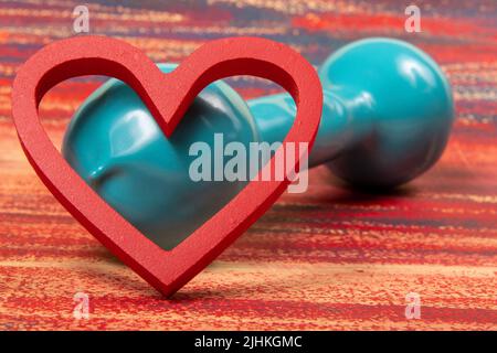 Heart shape and weight for physical activity to symbolize ...