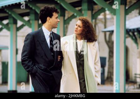 Tom Hanks as Josh Baskin and Elizabeth Perkins as Susan Lawrence in Big ...