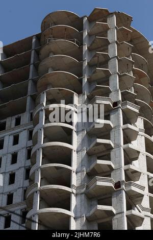 Unfinished concrete column under tower construction with protruded ...