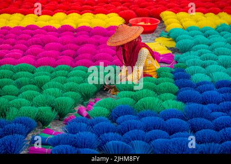 Workers crafting colorful plastic straws from pipes—pattern, texture ...
