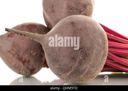 Three sweet red beets, close-up, on a white background Stock Photo - Alamy