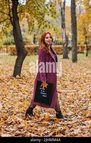Happy November alphabet letter with red maple leaves decoration on ...